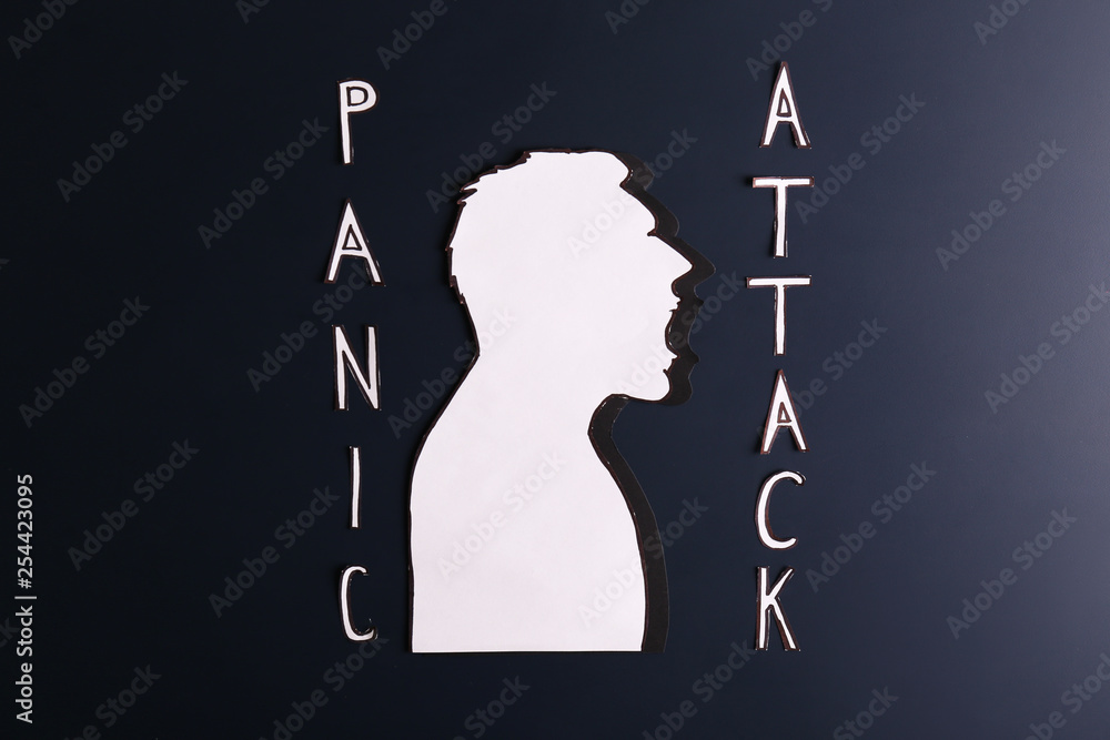 Panic attack and mental health awareness concept. Paper silhouette of a ...