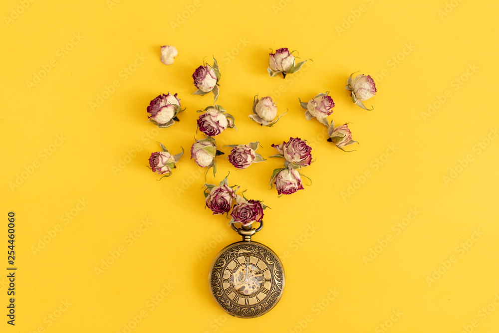 Vintage pocket watch and hour glass or sand timer, symbols of time with ...