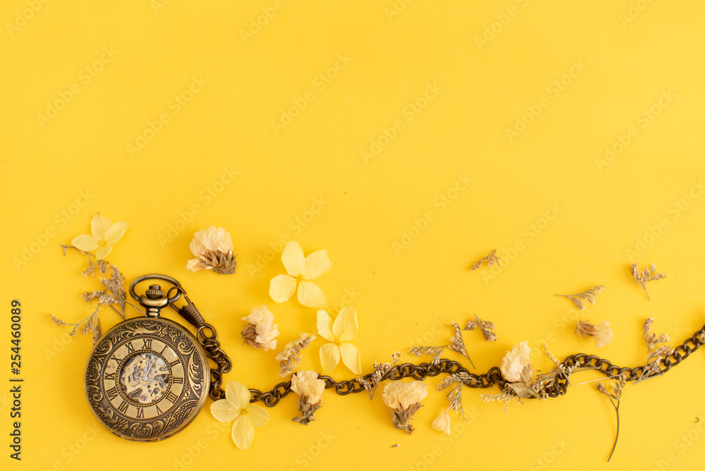 Vintage pocket watch and hour glass or sand timer, symbols of time with ...