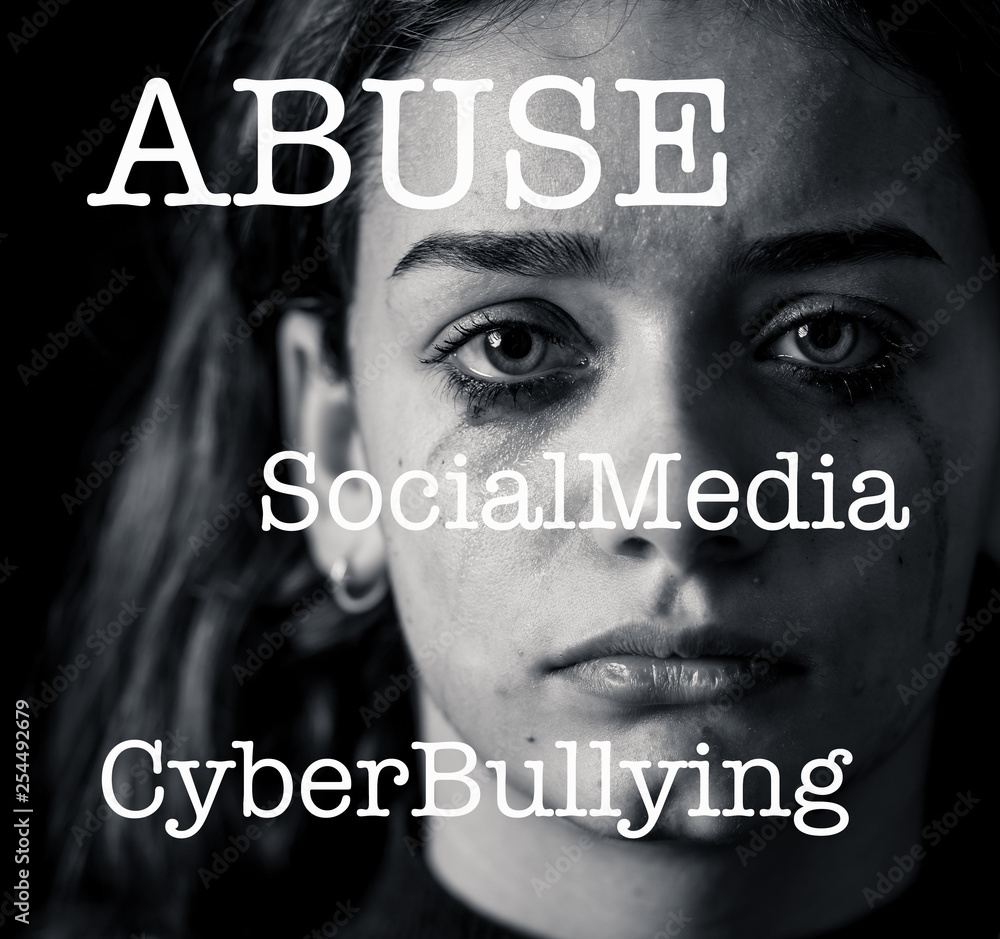 Portrait of young girl crying suffering verbal abuse online. Stop ...
