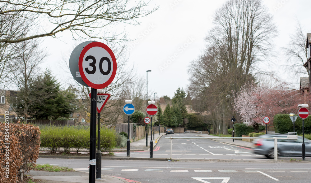 London, UK - March 2019: UK road signs showing speed, give way, one way ...
