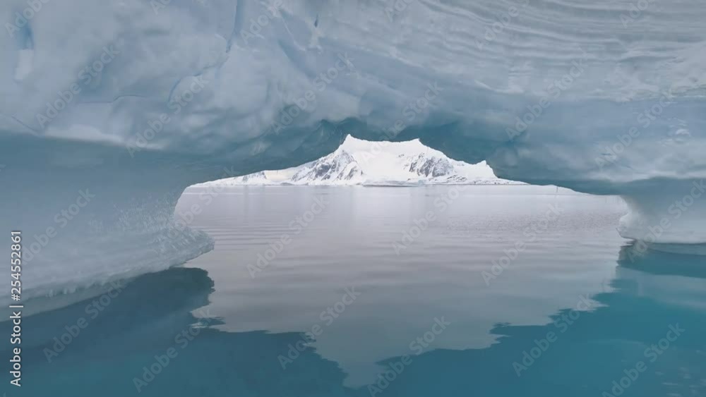 Antarctica Iceberg Arch Ocean Blue Water Glacier Seascape. Hole in ...