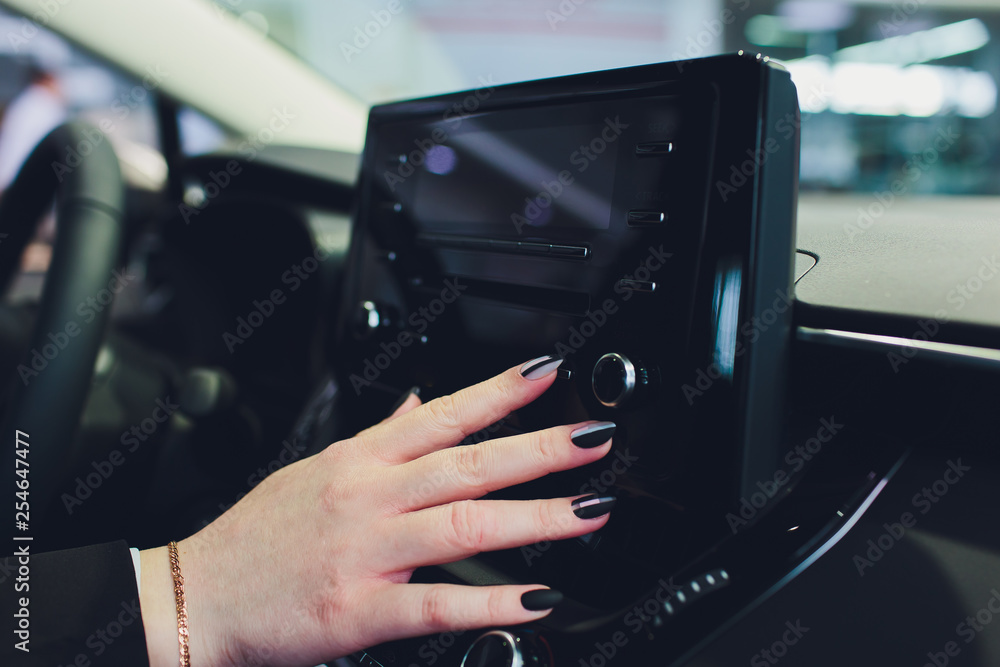 Transportation,technology and vehicle concept - man using car system ...