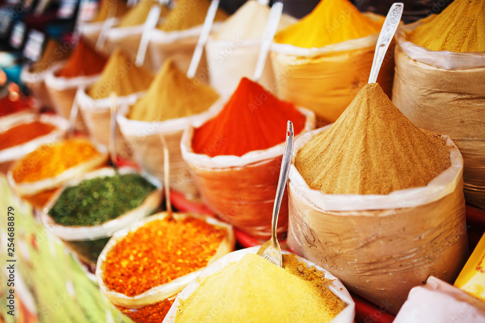 Indian colored spices at local market. A variety of spices of different ...
