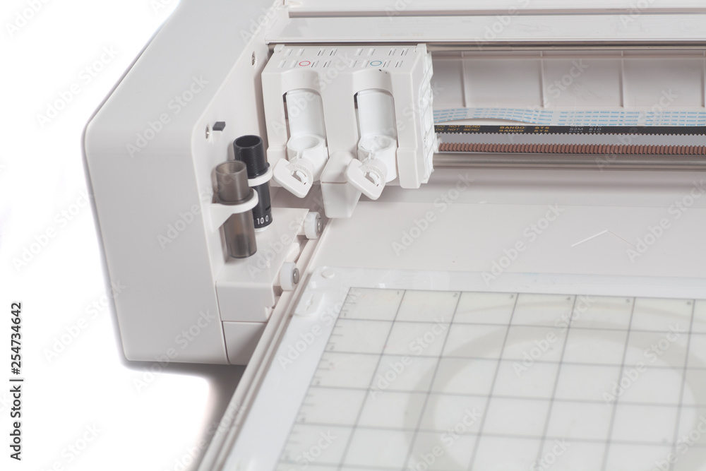 Cutting plotter isolated on white background Stock Photo | Adobe Stock