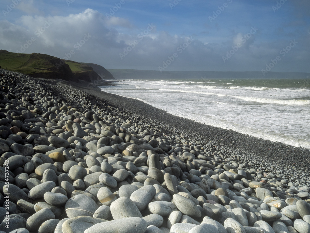 Pebble beach on the coast path between Abbotsham and Westward Ho on the ...