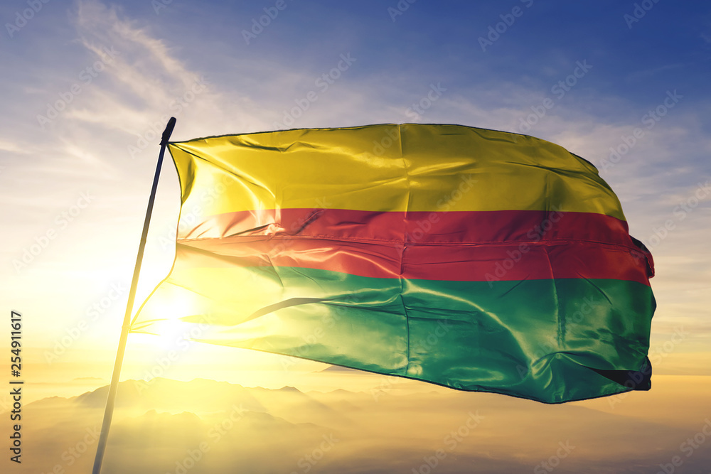 Humacao municipality of Puerto Rico flag waving on the top sunrise mist ...