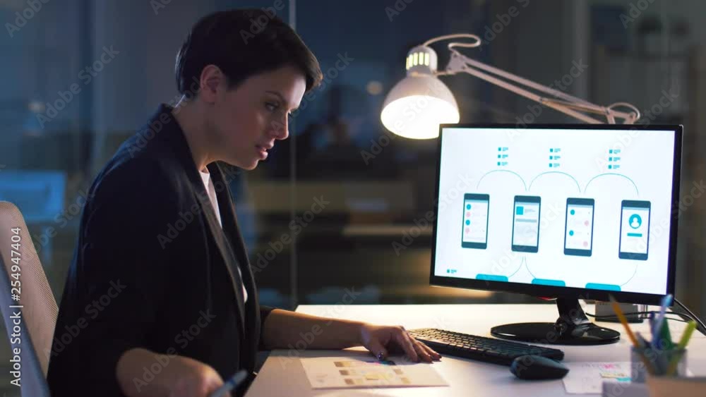 business, technology and people concept - ui designer with smartphone ...