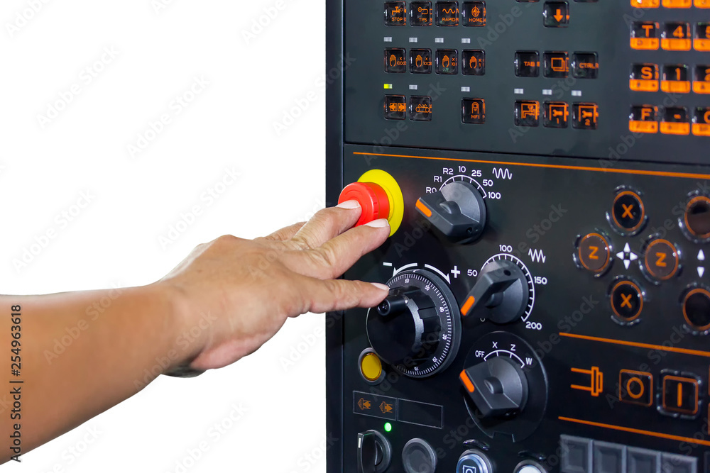 operator use finger press emergency stop of control panel cnc lathe ...
