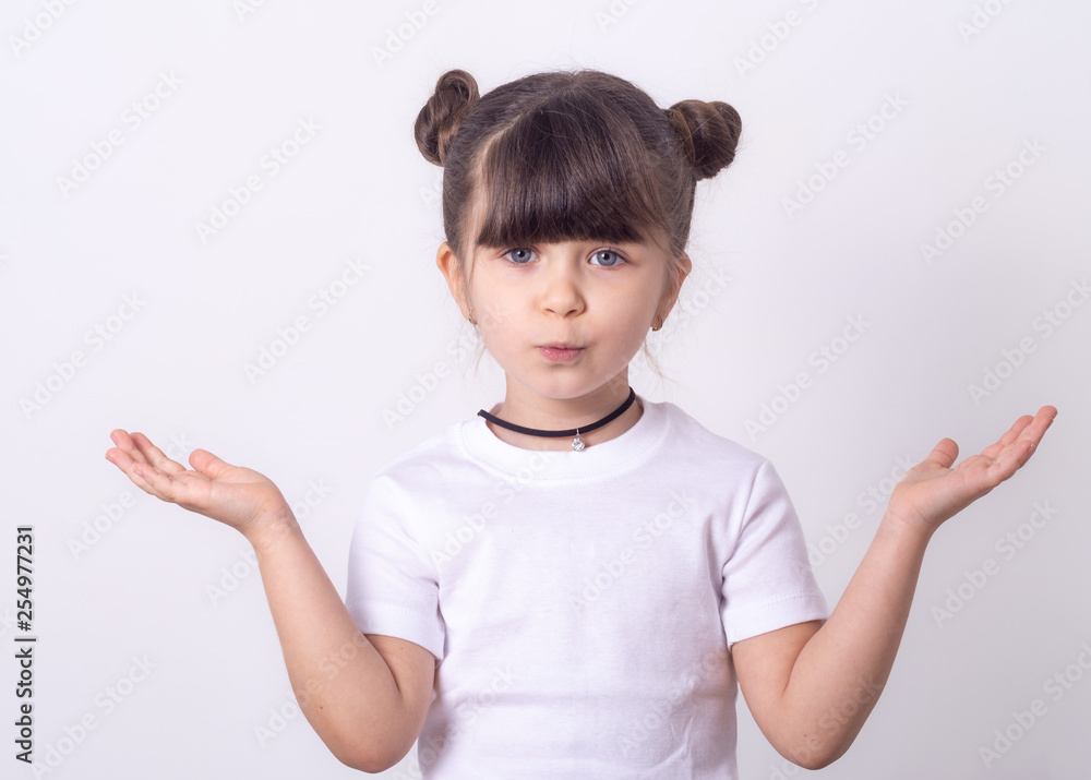 Kid shrugging shoulders and say I don't know. Dazed and confused child ...