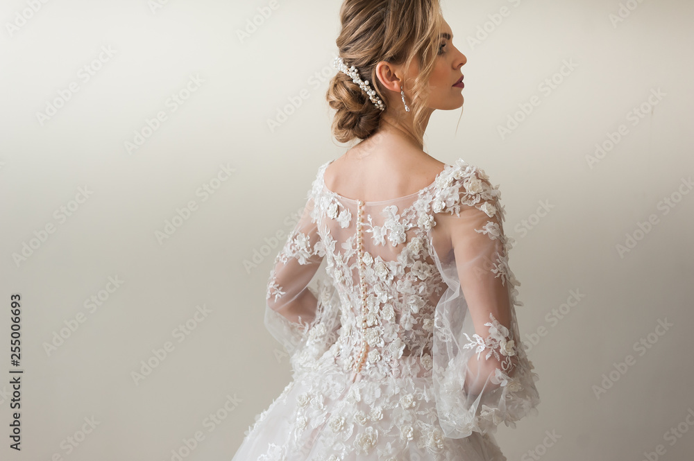 Beautiful bride wearing fashion wedding dress with feathers with luxury ...