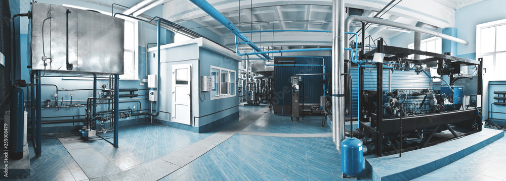 Interior of the boiler room with gas disassembled boiler and pipes for ...