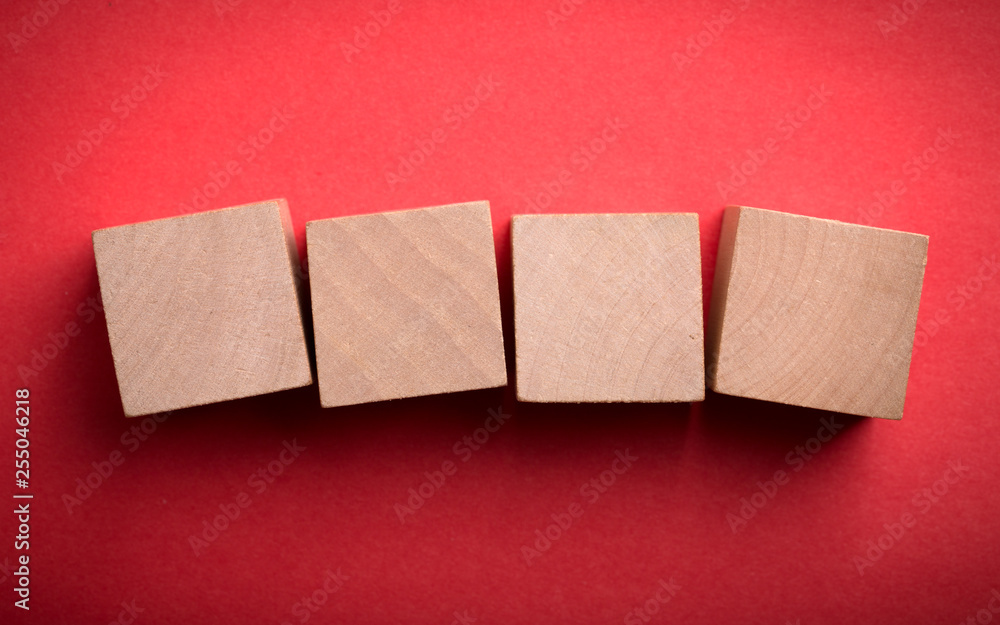 Four Blank Wooden Blocks isolated Stock Photo | Adobe Stock