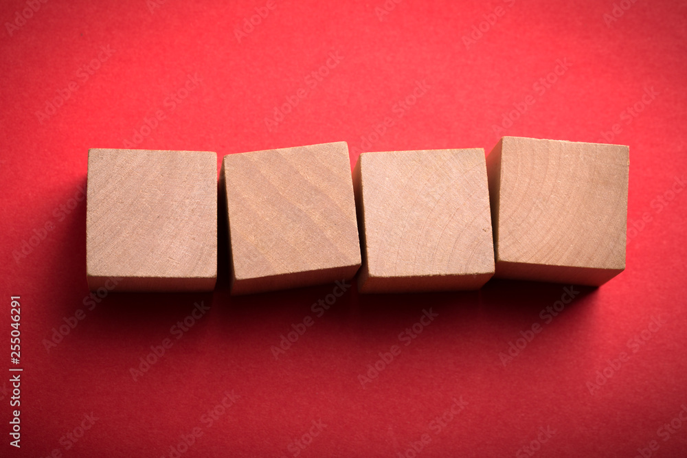 Four Blank Wooden Blocks isolated Stock Photo | Adobe Stock