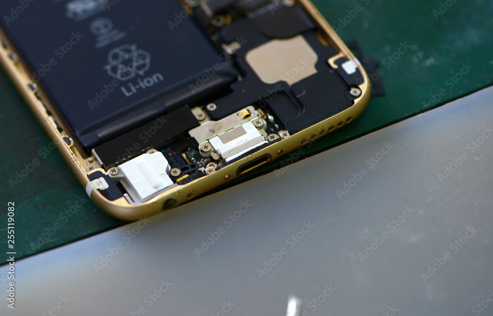 technician repairing broken mobile phone close-up.Close-up Of A Human ...