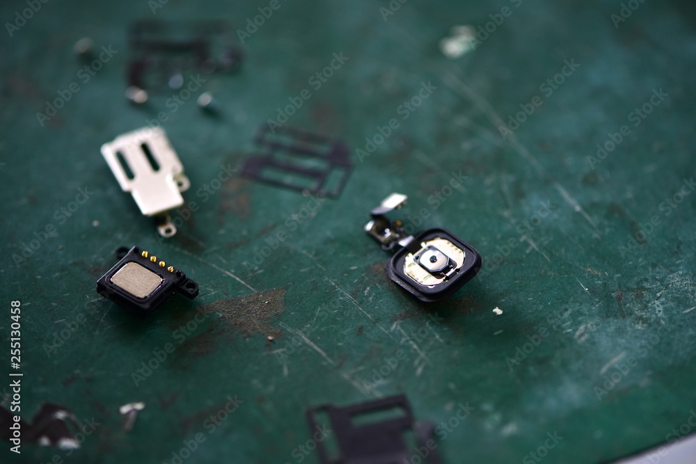 technician repairing broken mobile phone close-up.Close-up Of A Human ...