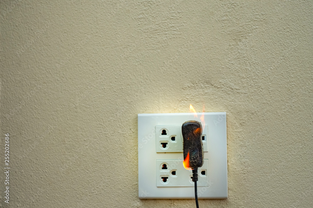 On fire electric wire plug Receptacle and adapter on partition ...