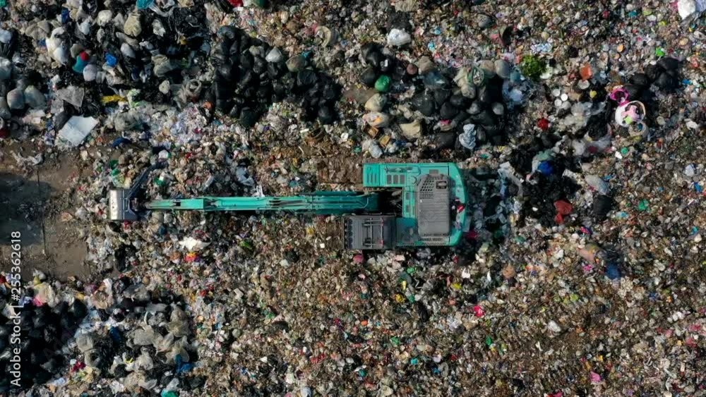 Garbage pile in trash dump or landfill, Aerial view garbage trucks ...