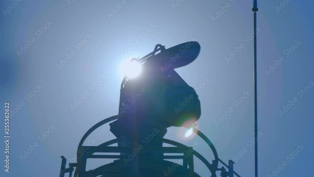 Weather radar with a rotating radiodetection antenna on top of a ...