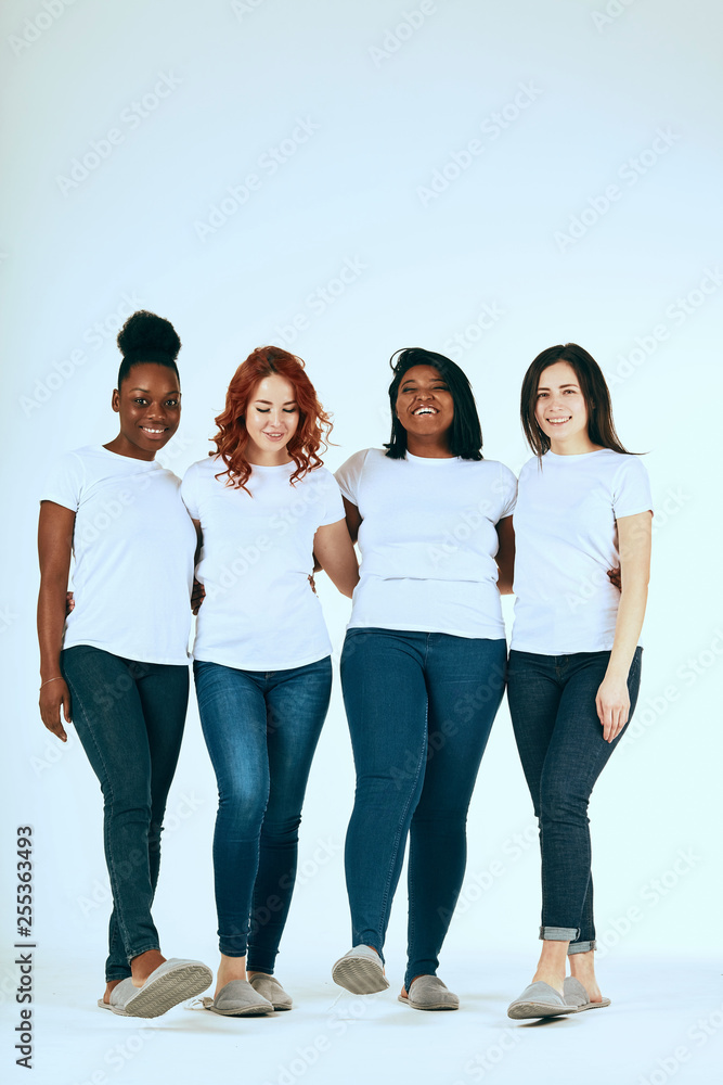 Four young multi ethnic female models of different race, body size and ...