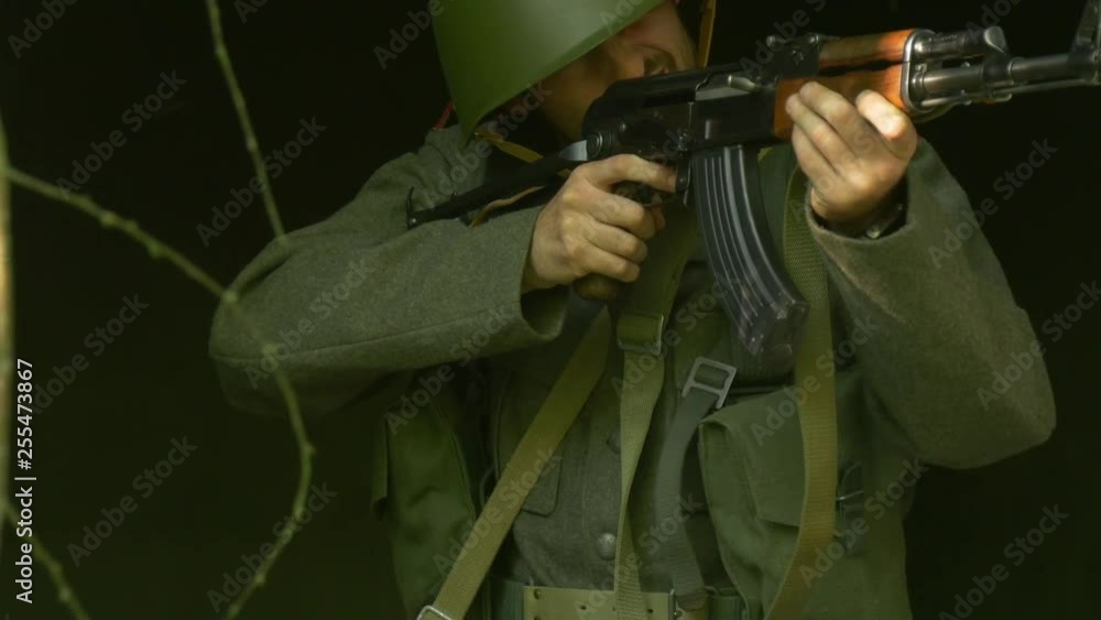 Soldier aiming with a AK-47 SU – Moving Camera Stock Video | Adobe Stock