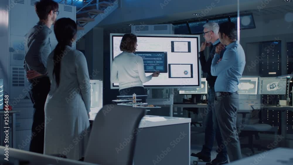 Engineers Meeting in Technology Research Laboratory: Female Engineer ...