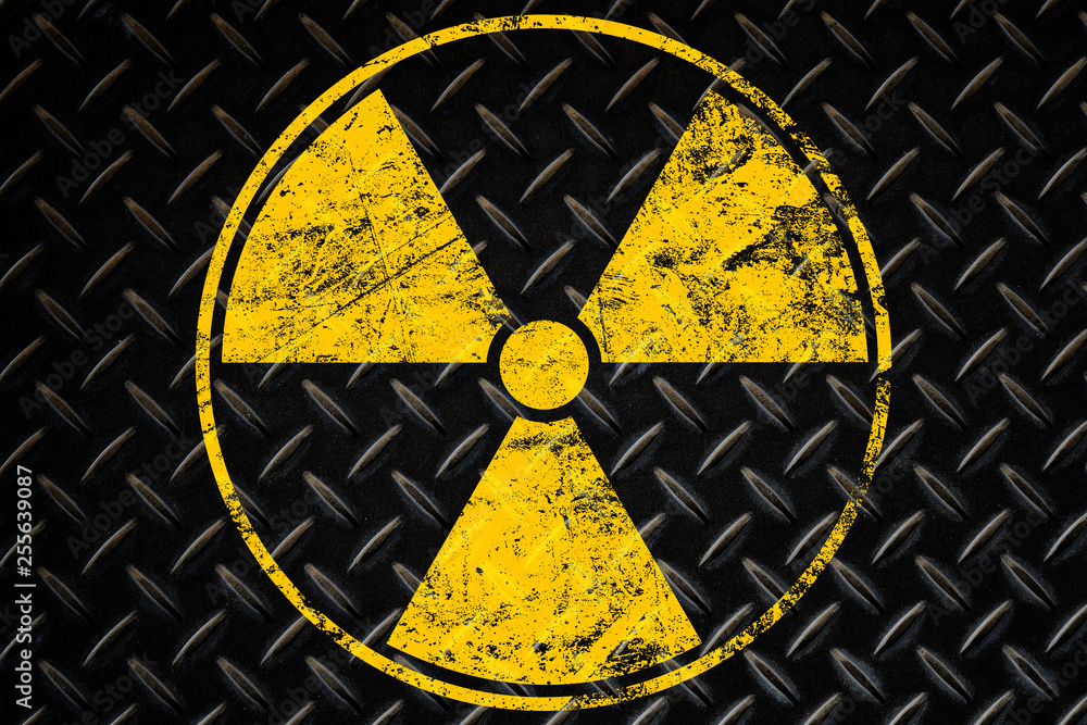 Yellow radioactive sign over black background Stock Photo | Adobe Stock