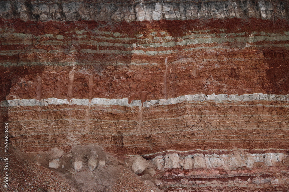 texture of different layers of clay underground in clay quarry after ...