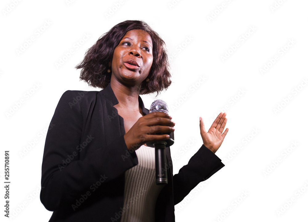 confident black African American business woman with microphone ...