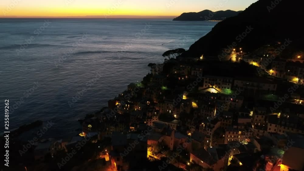 Stunning sunset of the beautiful village on the sea. Seaside Town in ...