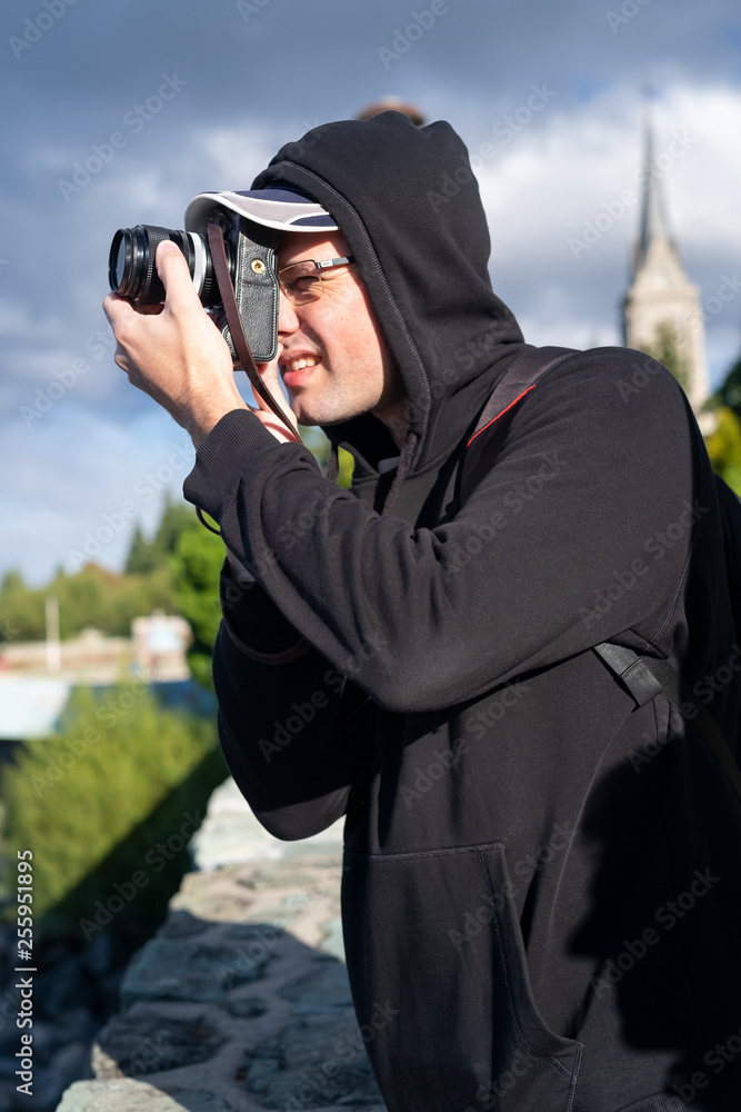 man with camera taking a picture photographer studio set session lens ...