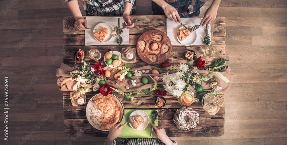 Apartment-feast of friends or family at the festive table with rabbit ...