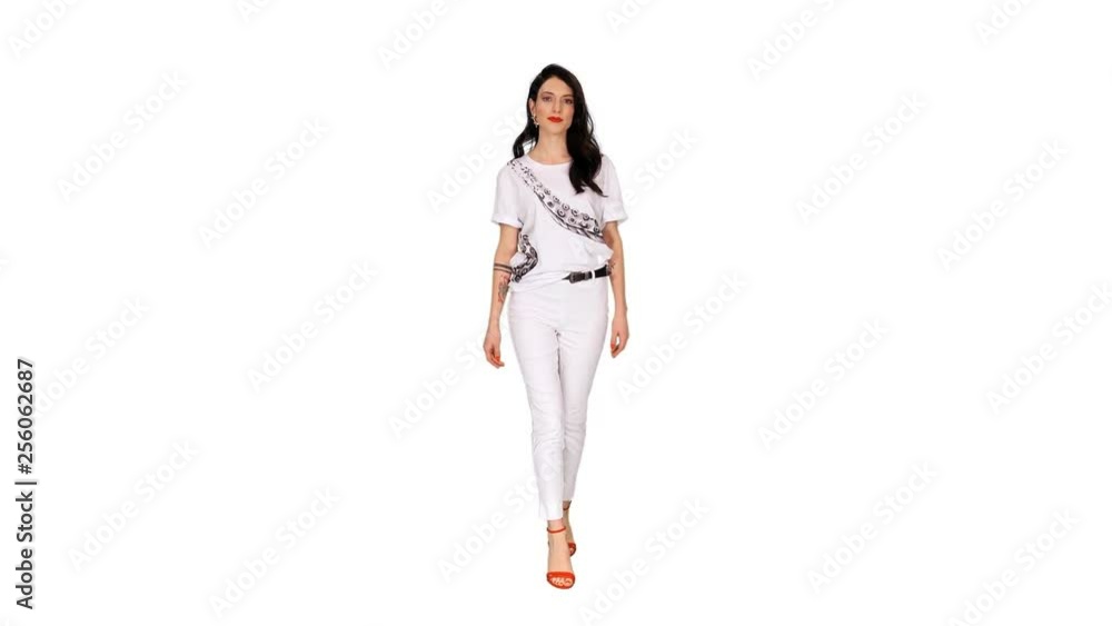 Elegant brunette woman in white walking like a runway model, Full HD ...