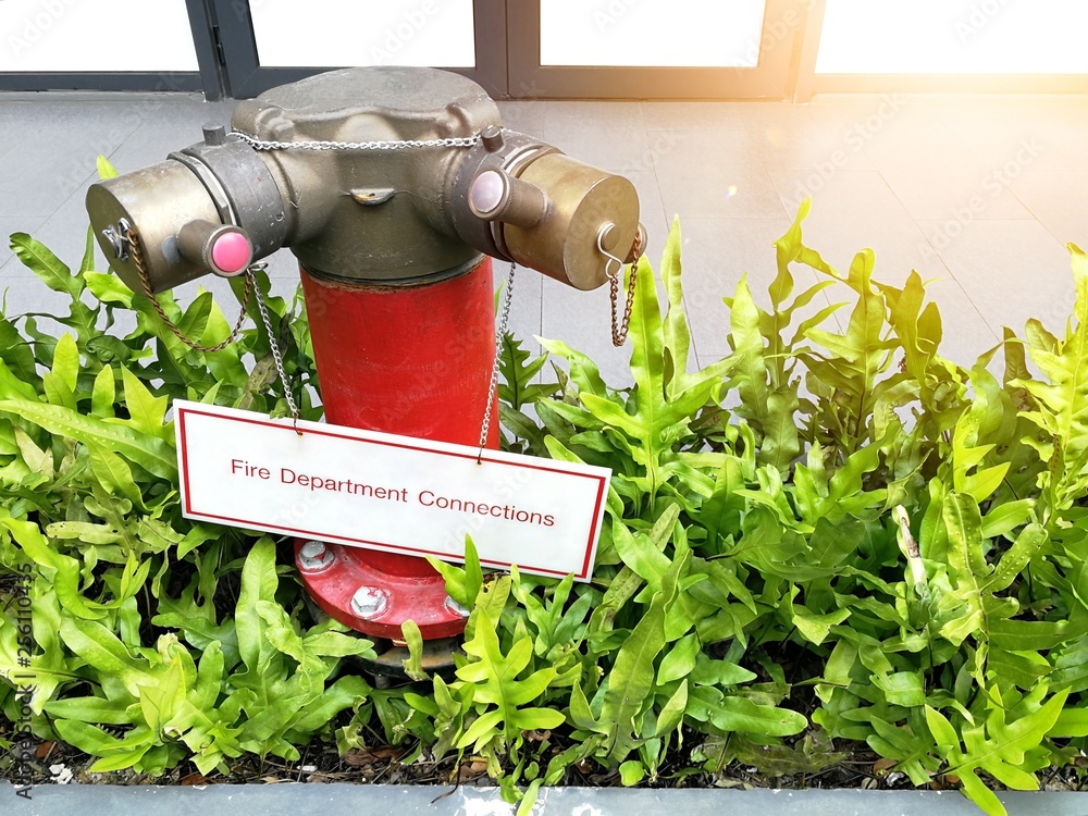 Fire Department Connection on Garden along sidewalk. Stock Photo ...