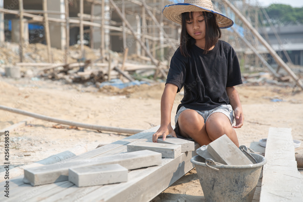 Poor children working at construction site against children labour ...