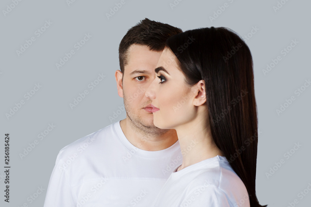 Half man half woman on a gray background. couple man and woman as one ...