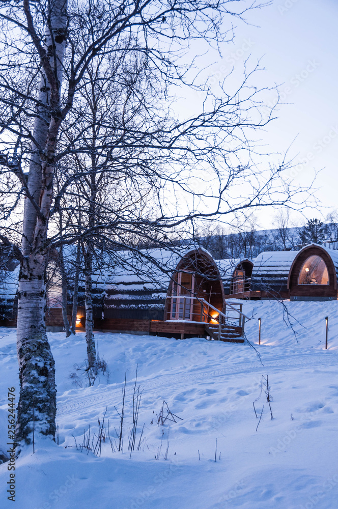 Snow covered winter cabin or Gabba designed after the Sami tribe lavvu ...
