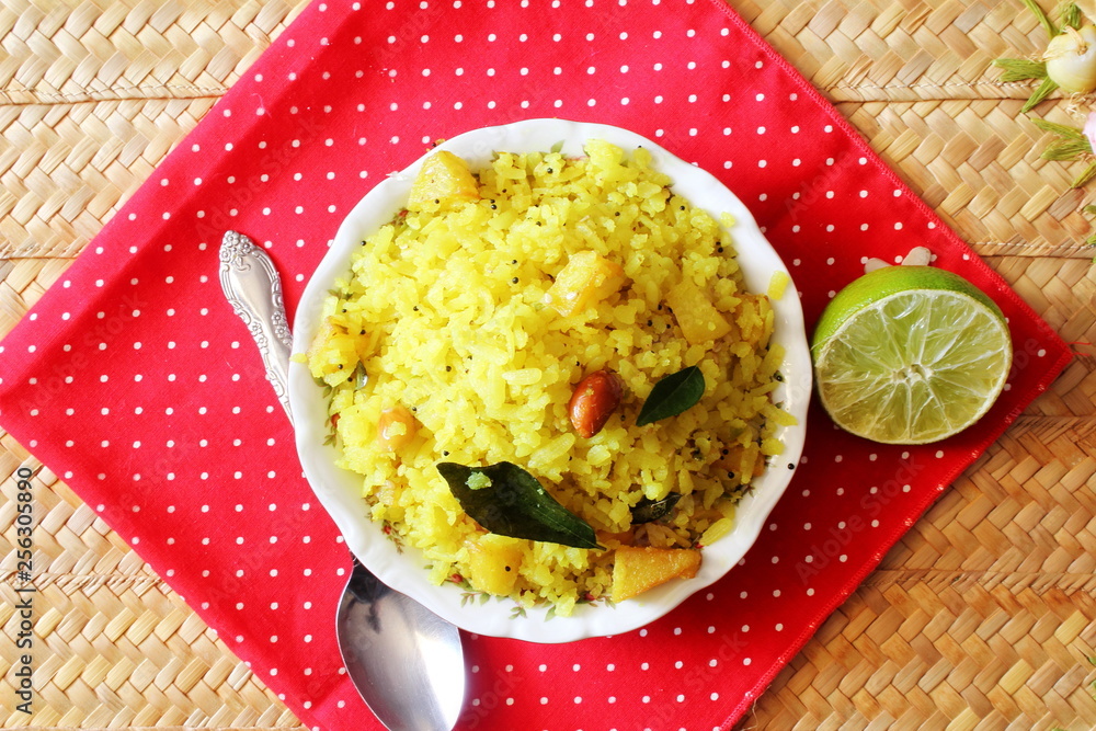 indian traditional breakfast food potato poha or batata poha spicy ...
