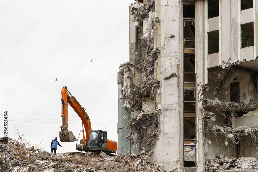 Building of the former hotel demolition for new construction, using a ...