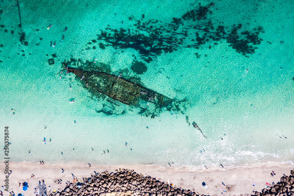 Aerial / drone photo over snorkelers at the Omeo shipwreck at Port ...