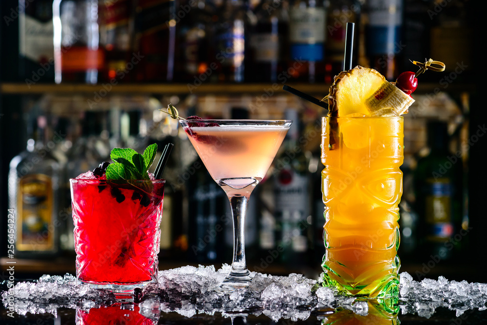 beautiful bright cocktails on the bar in the nightclub Stock Photo ...