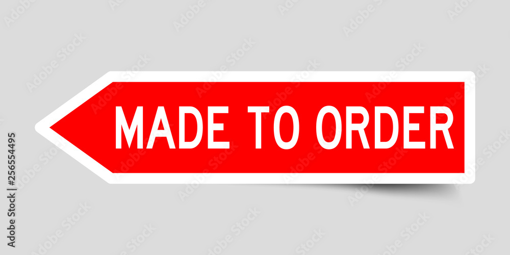 Arrow shape red color label sticker in word made to order on gray ...