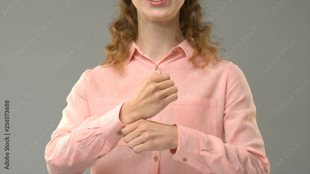 Deaf woman saying happy new year in sign language, showing words in asl ...