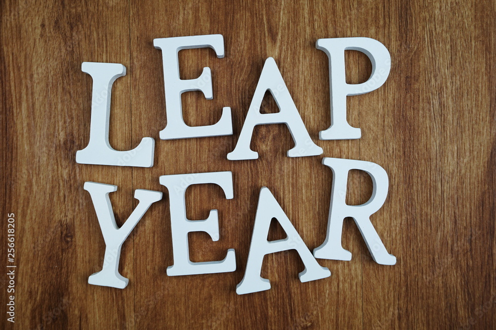 Leap Year alphabet letter with space copy on wooden background Stock ...