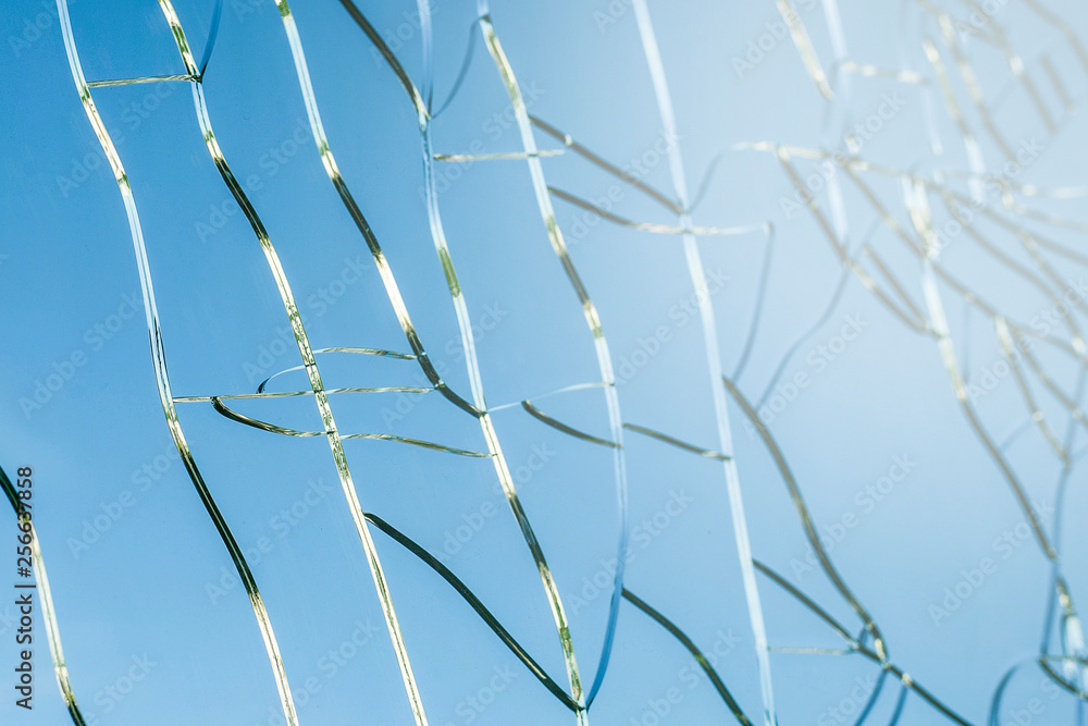 Cracked transparent window glass with blue sky background Stock Photo ...