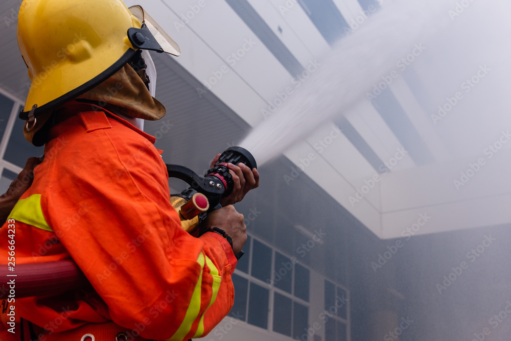 Firefighter Hose Spraying