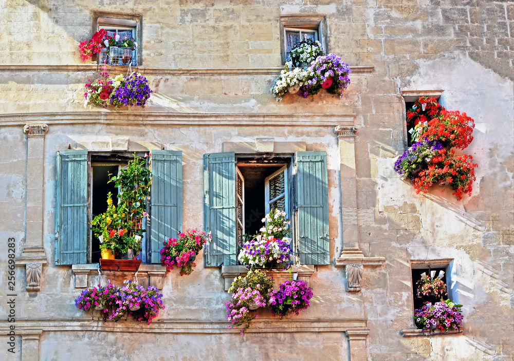 Foto de Typical facade of the old Provencal retro house with windows ...