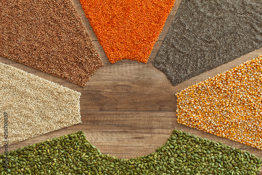 Colorful grains and seeds background with copy space - healthy whole ...