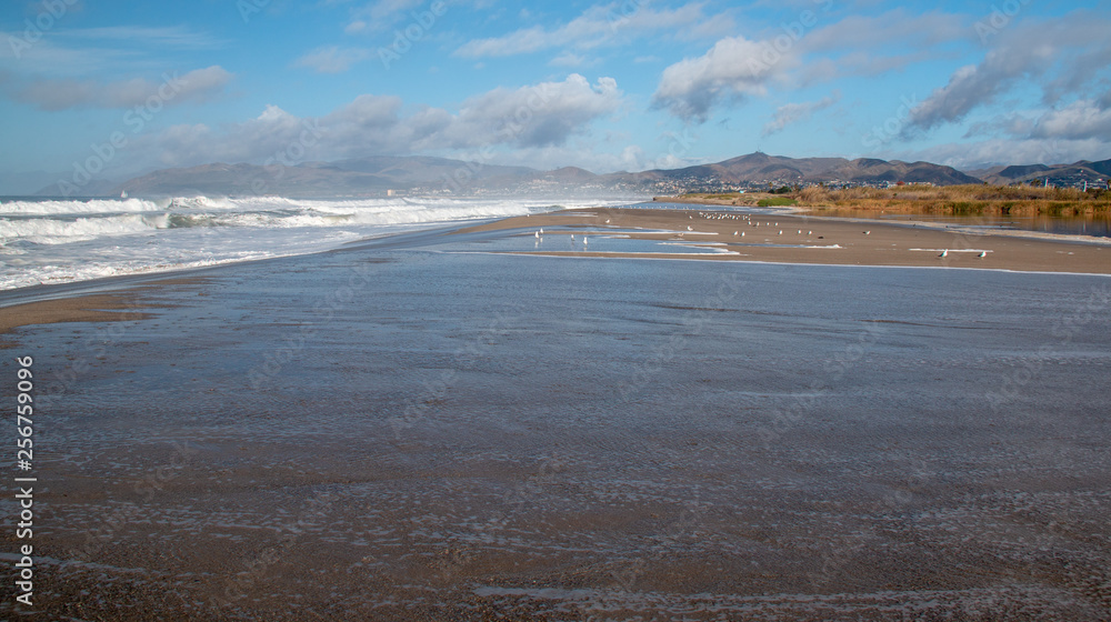 Wave sea water overflowing into Santa Clara river mouth estuary in ...