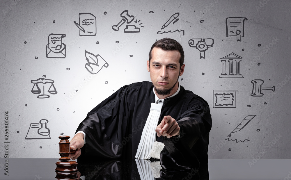 Handsome judge with court symbols around Stock Photo | Adobe Stock